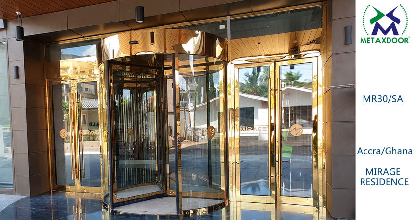 Automatic revolving door made of gold-polished stainless steel HTM ...